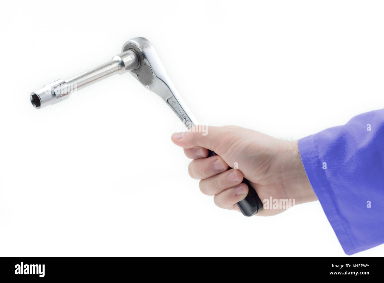 Hand holding a wrench Stock Photo - Alamy