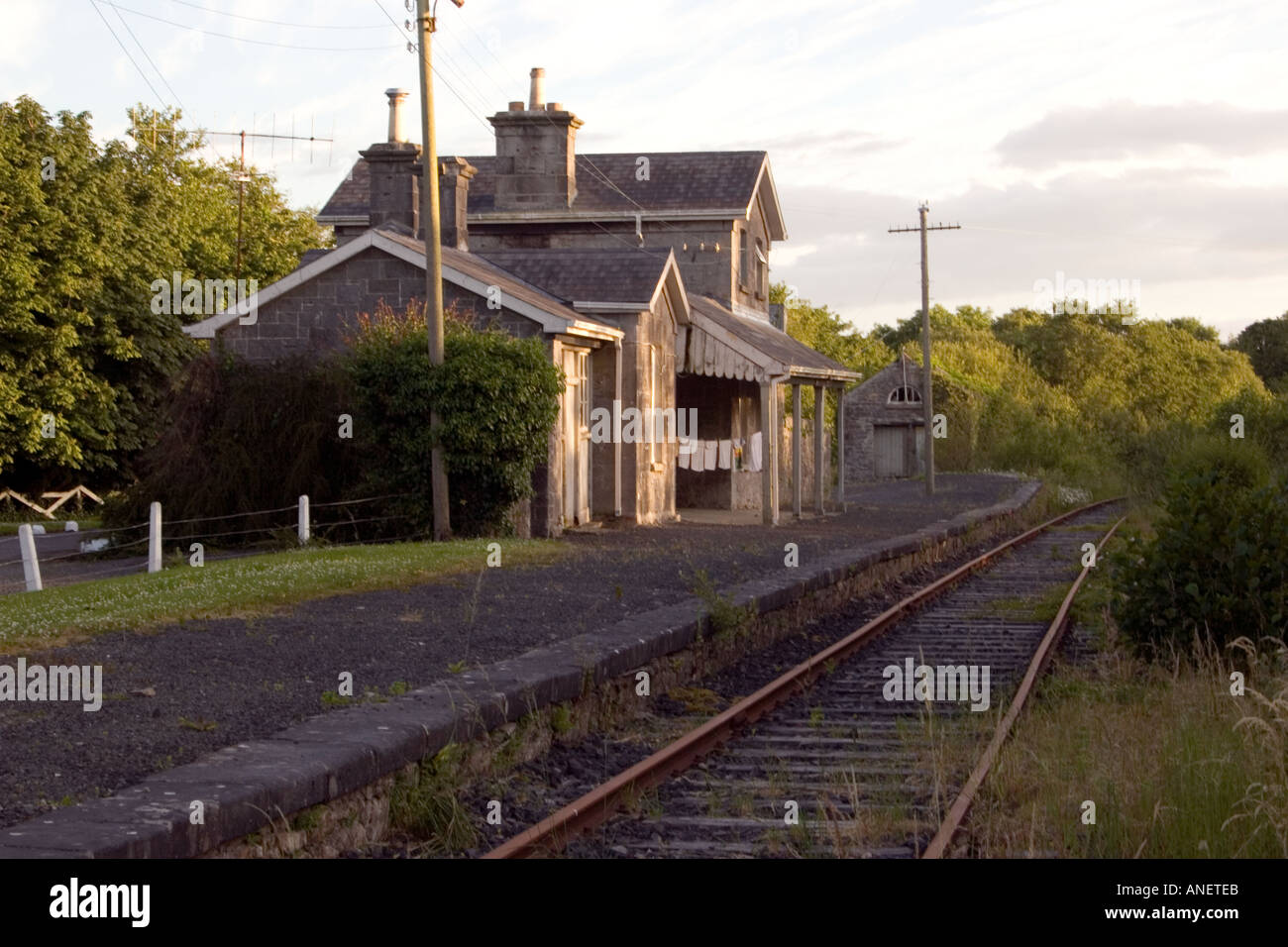Old Railway Station, with Iron gate and rickety fence. Adare, County ...