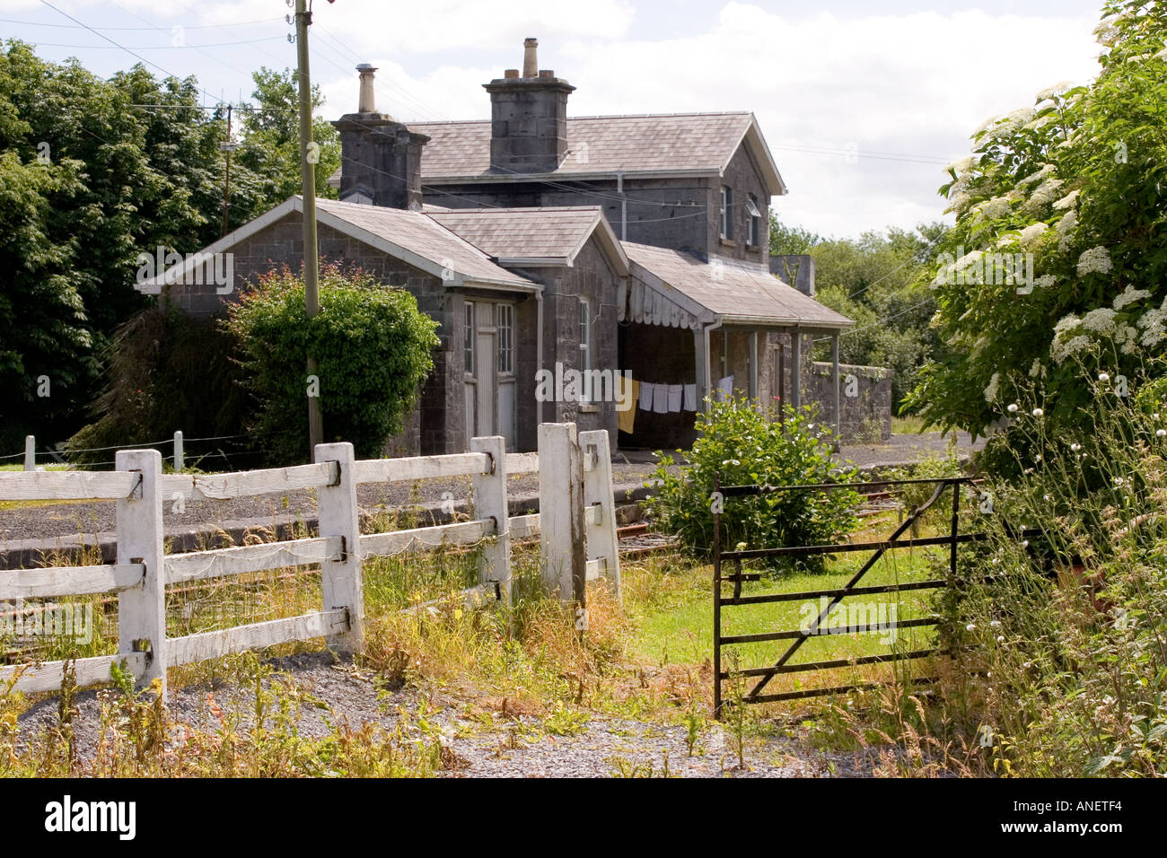 Old Railway Station, with Iron gate and rickety fence. Adare, County ...