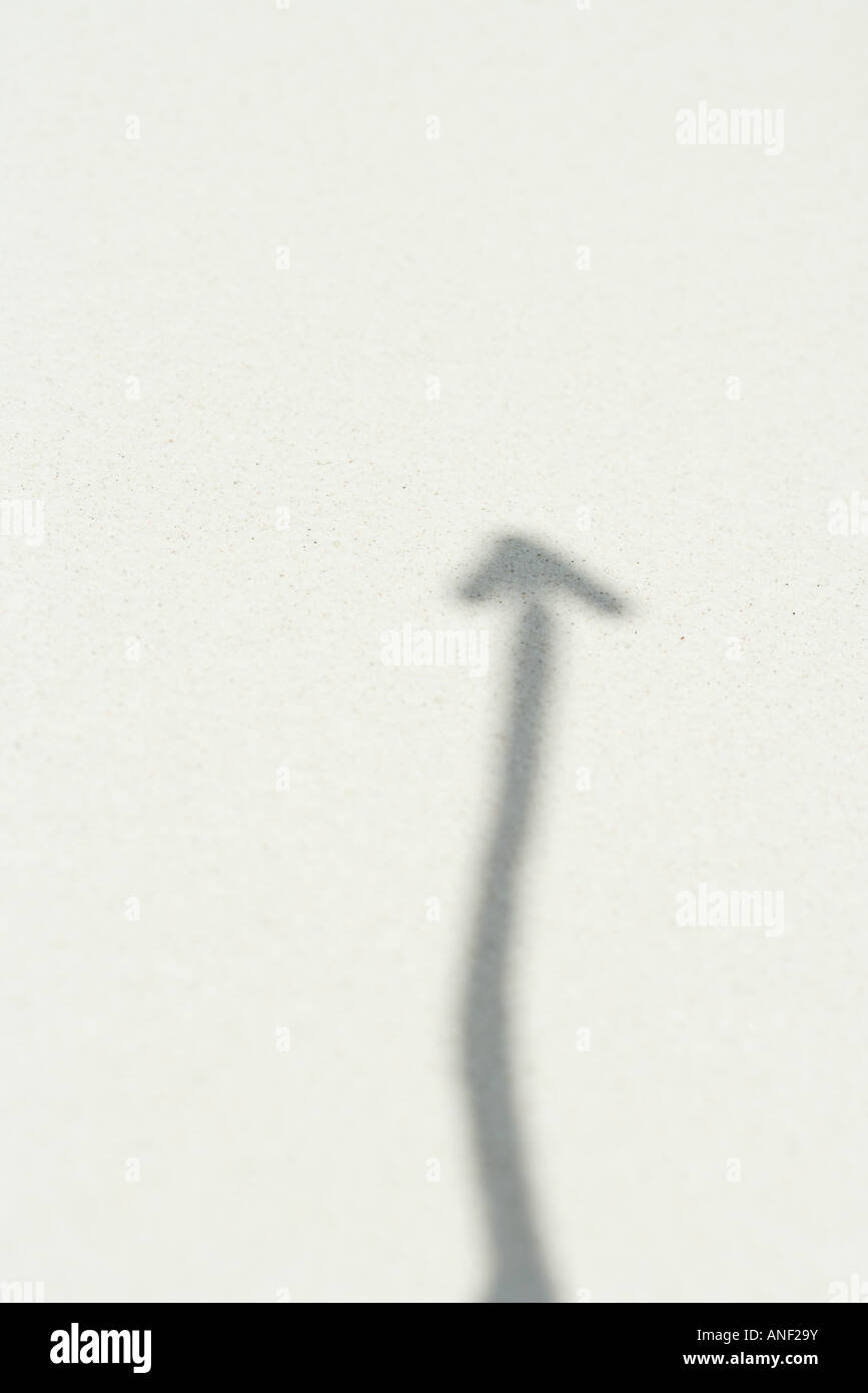 Arrow shadow on sand Stock Photo - Alamy