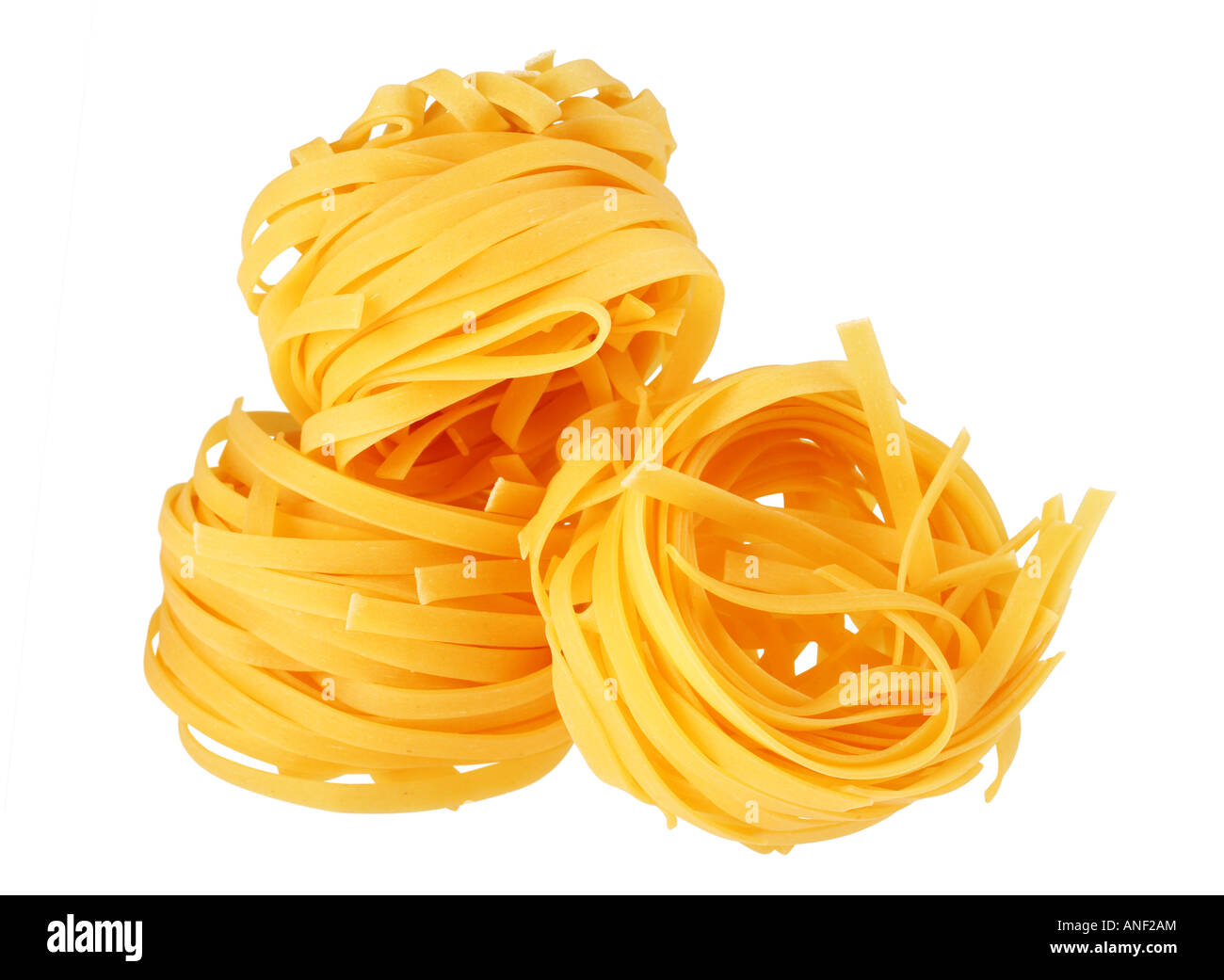 Raw round pasta isolated on white background Stock Photo - Alamy