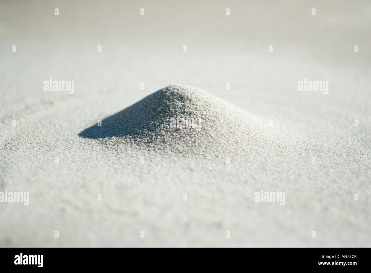 Mound of sand Stock Photo - Alamy