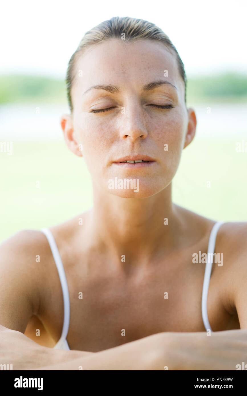 Woman with eyes shut, portrait Stock Photo - Alamy