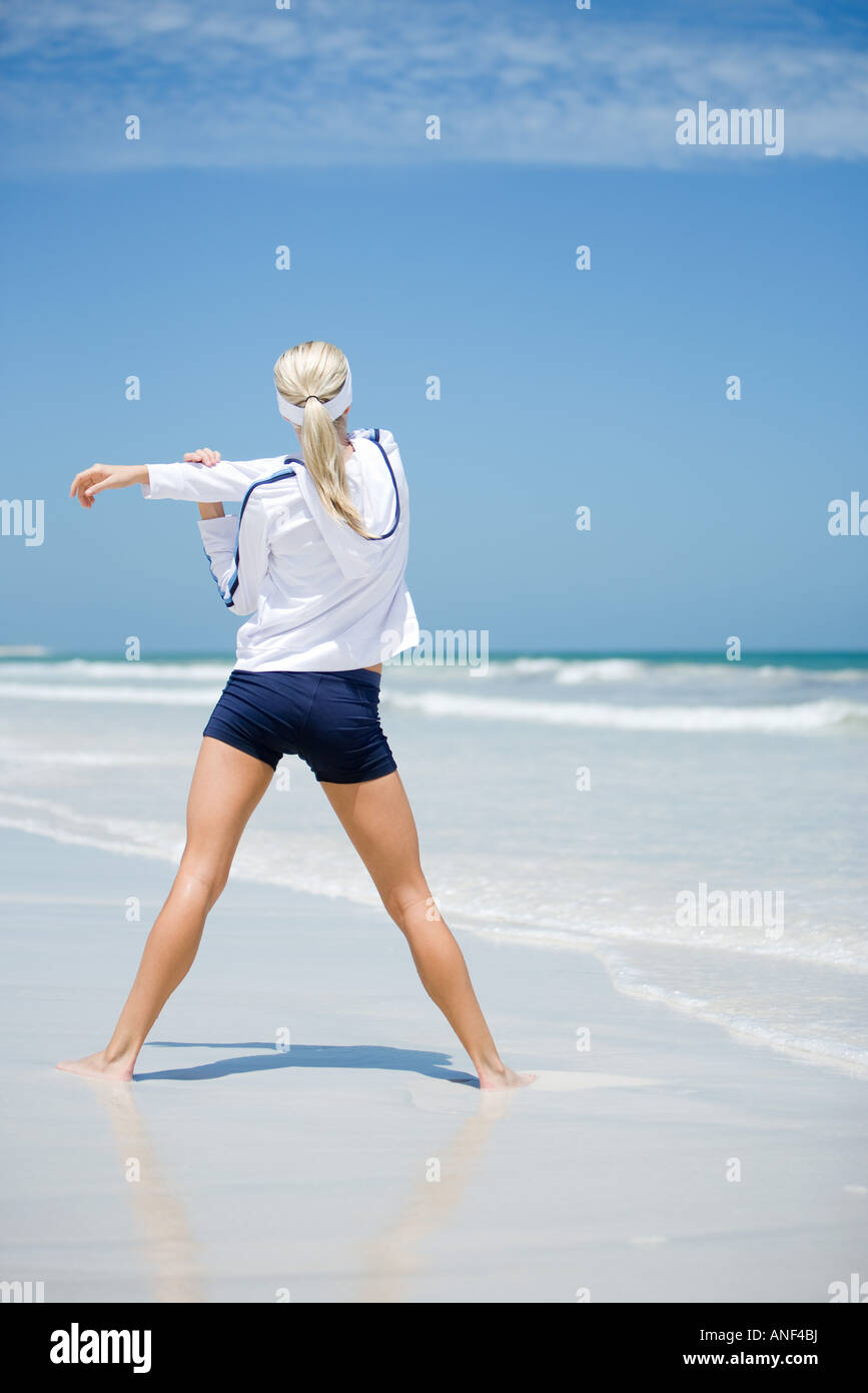 Blonde haired woman exercising, from a complete series of photos Stock ...