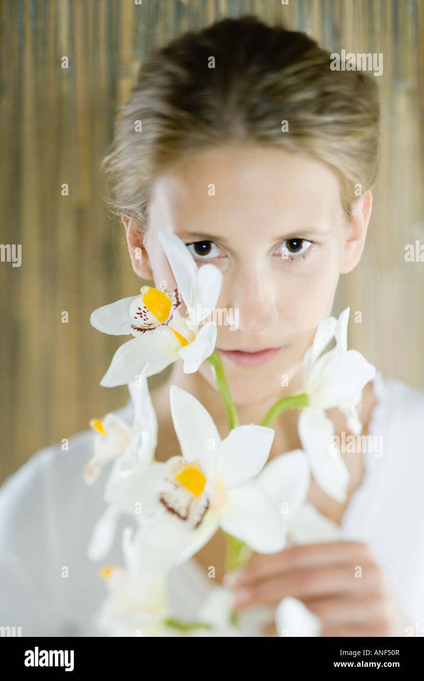 Woman gazing at flower hi-res stock photography and images - Alamy