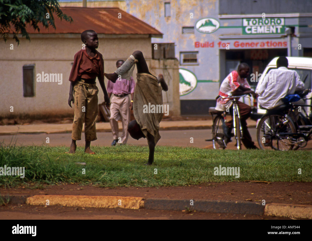 Group of orphan street children poorly dressed playing doing ...