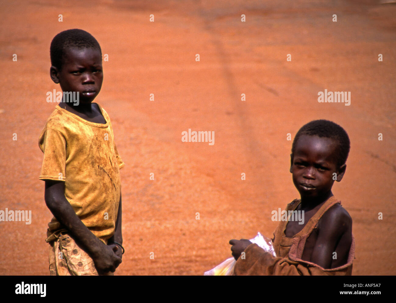 Portrait pair orphan street children adult boy deep look stare pensive ...