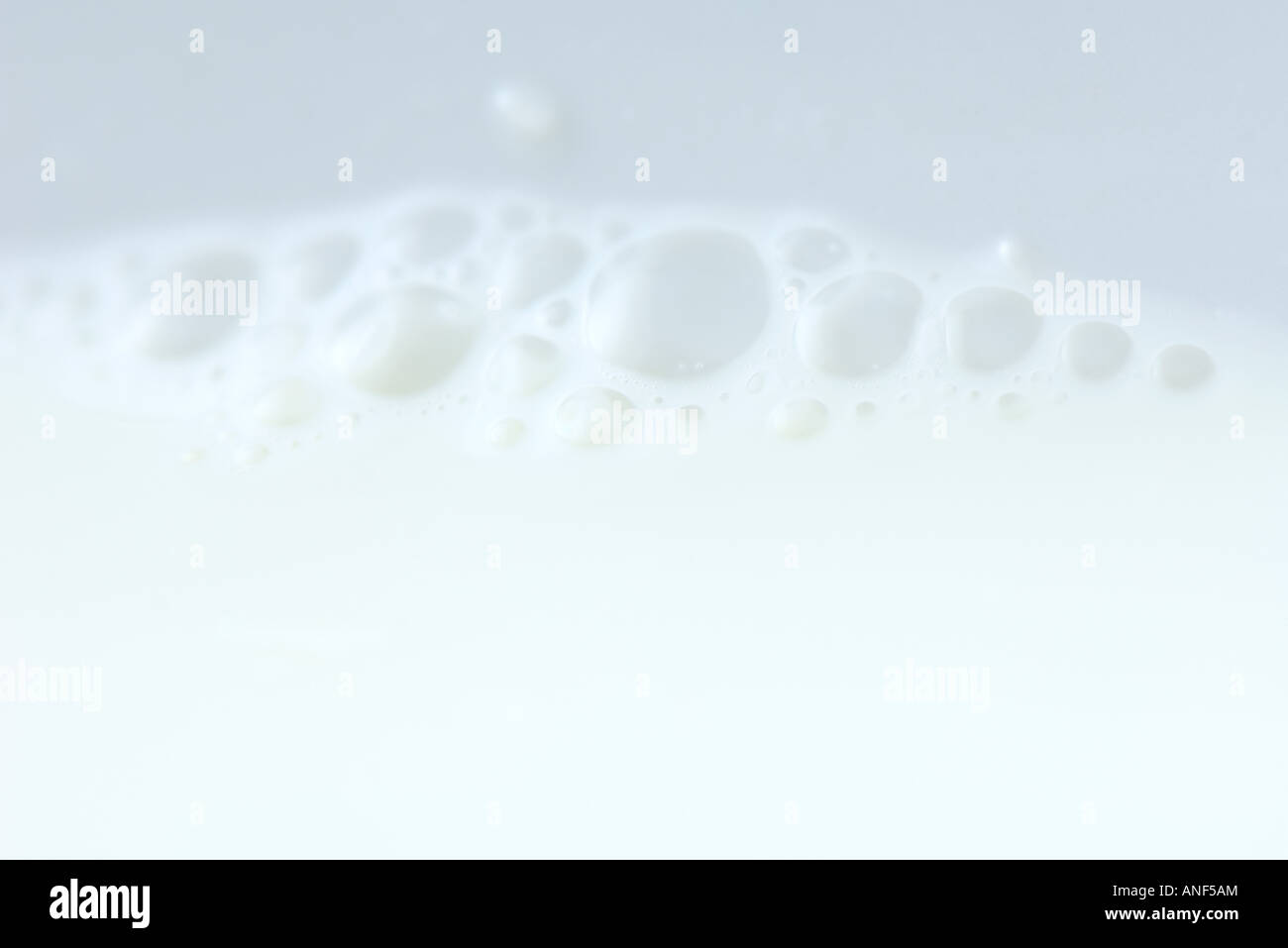 Milk bubbles, extreme close-up Stock Photo - Alamy