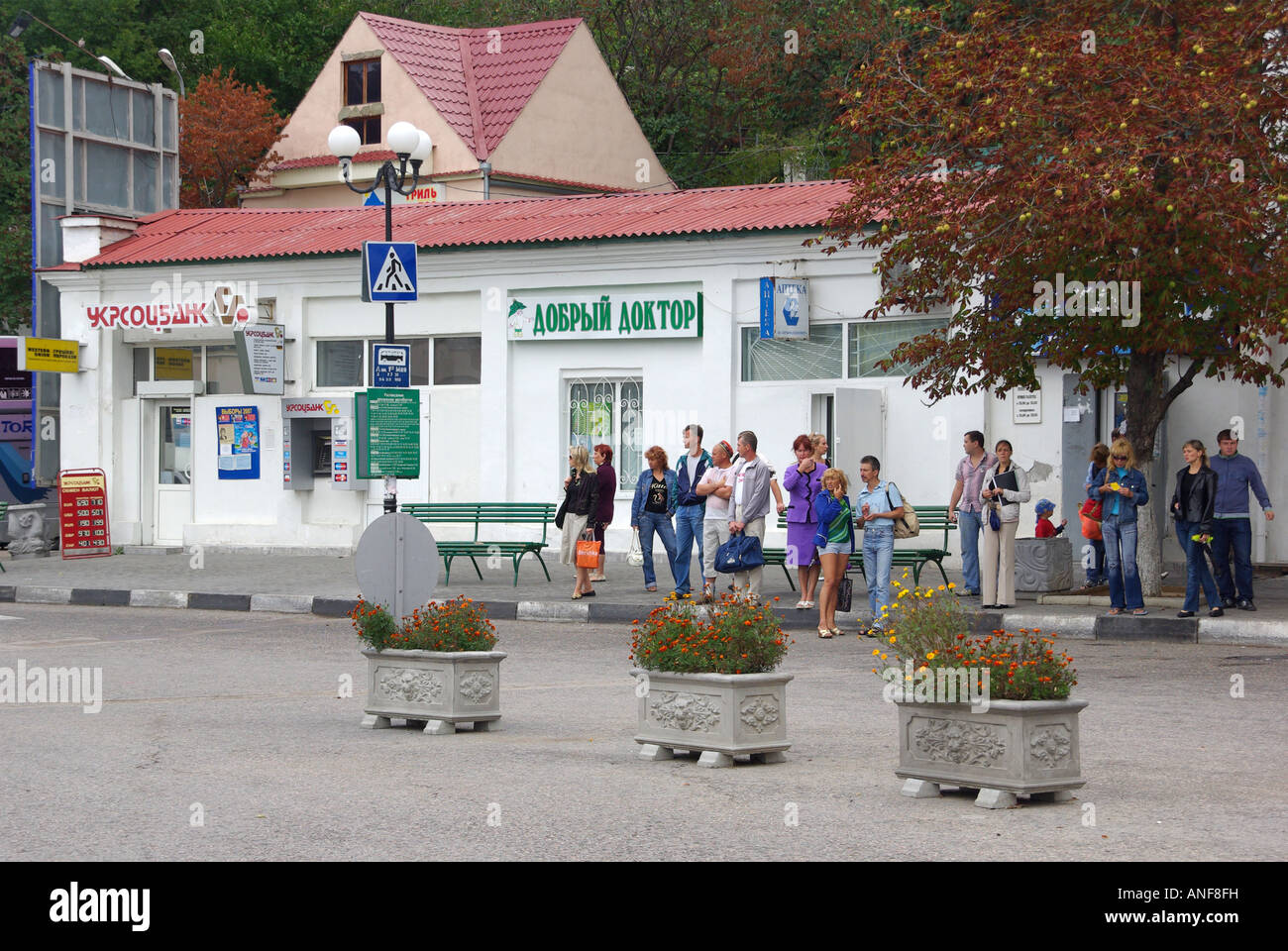 Balaclava town centre street scene people waiting at public transport ...