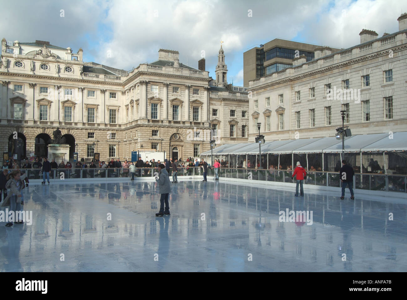 Adults & kids ice skaters with backdrop historical Somerset House ...