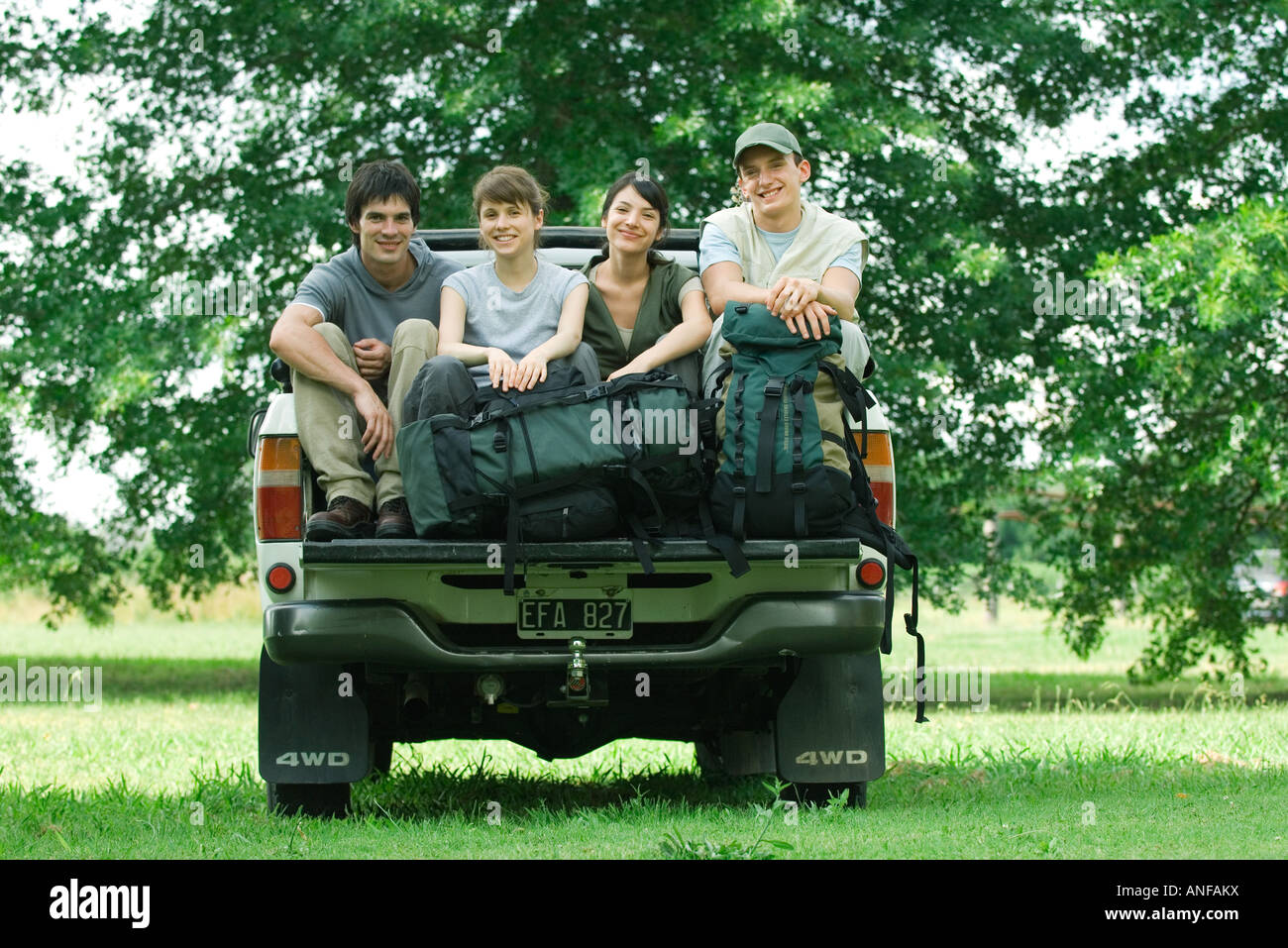 Group friends sitting back pick hi-res stock photography and images - Alamy