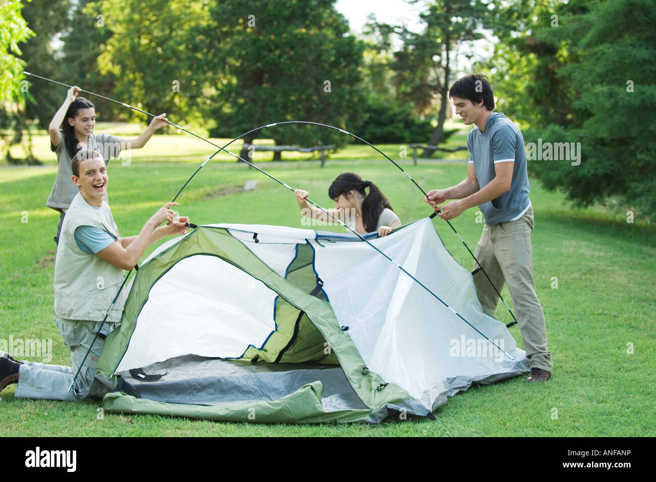 Young boy standing outside tent hi-res stock photography and images - Alamy