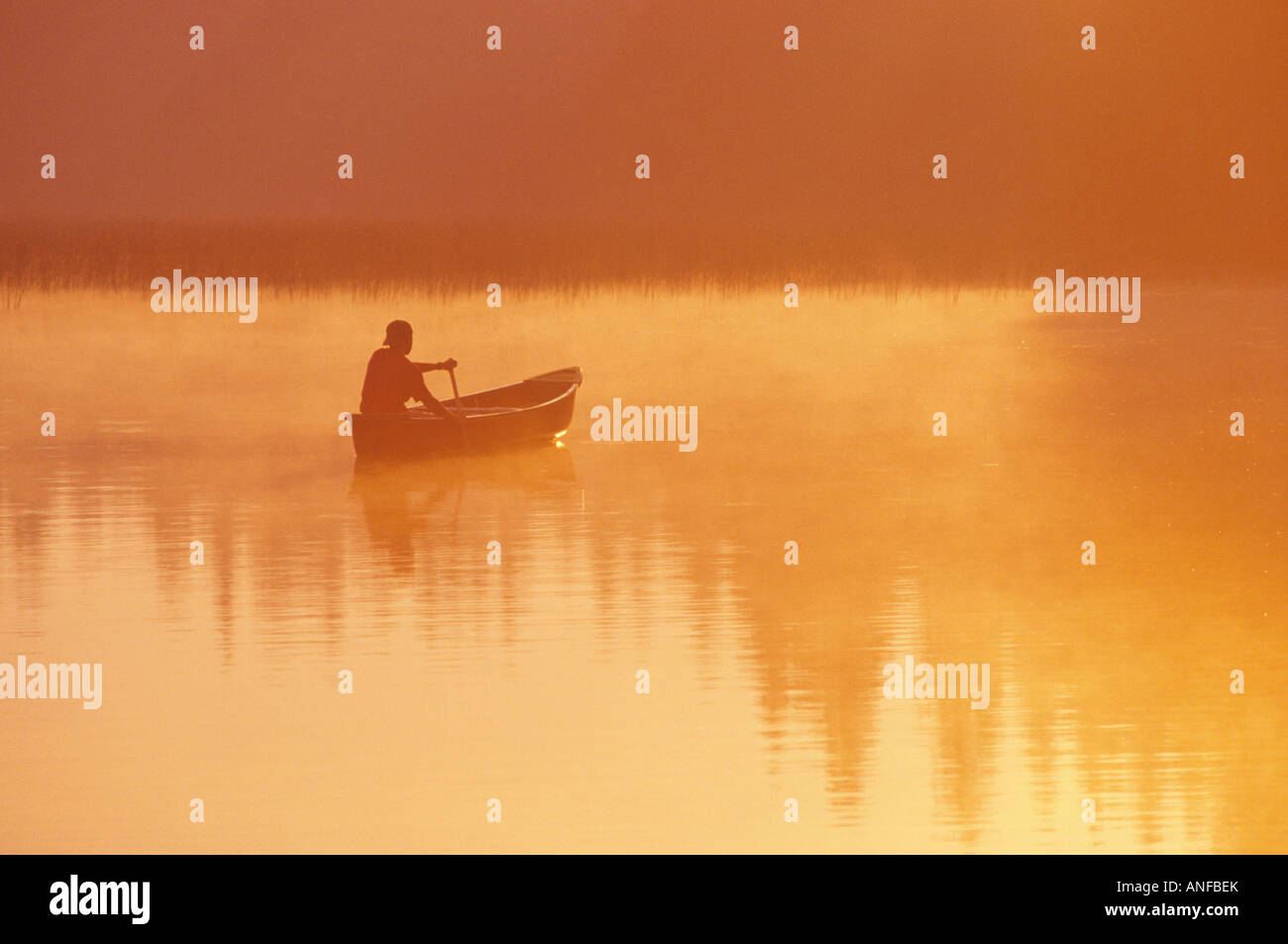 Canoeing on childs lake, duck mountain provincial park, manitoba ...
