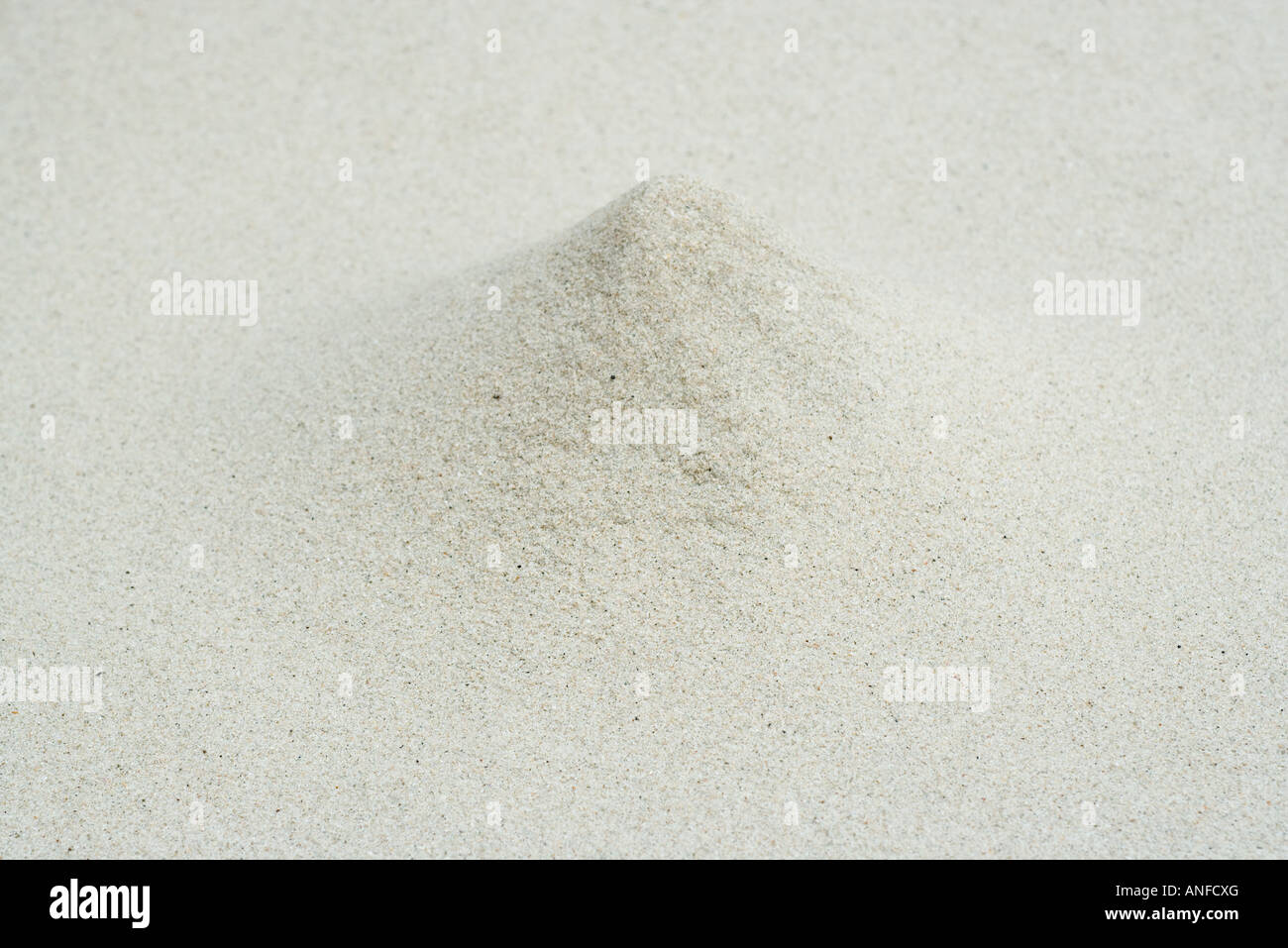 Mound of sand Stock Photo - Alamy