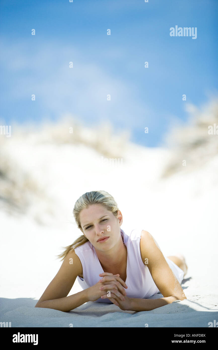 Woman lying on stomach beach hi-res stock photography and images - Alamy