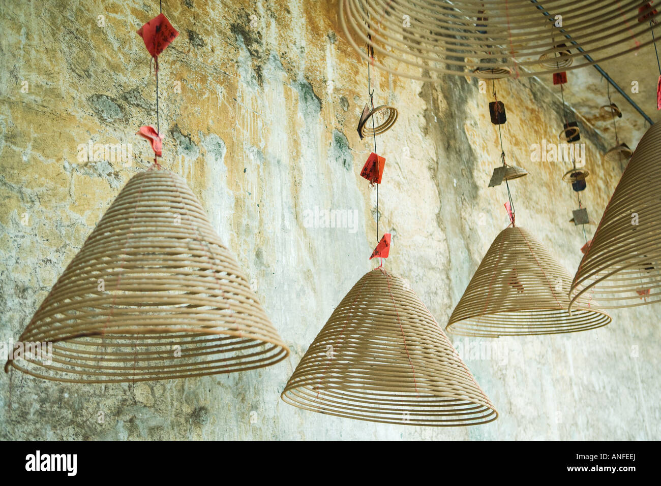 Spirals of incense hanging from ceiling Stock Photo - Alamy