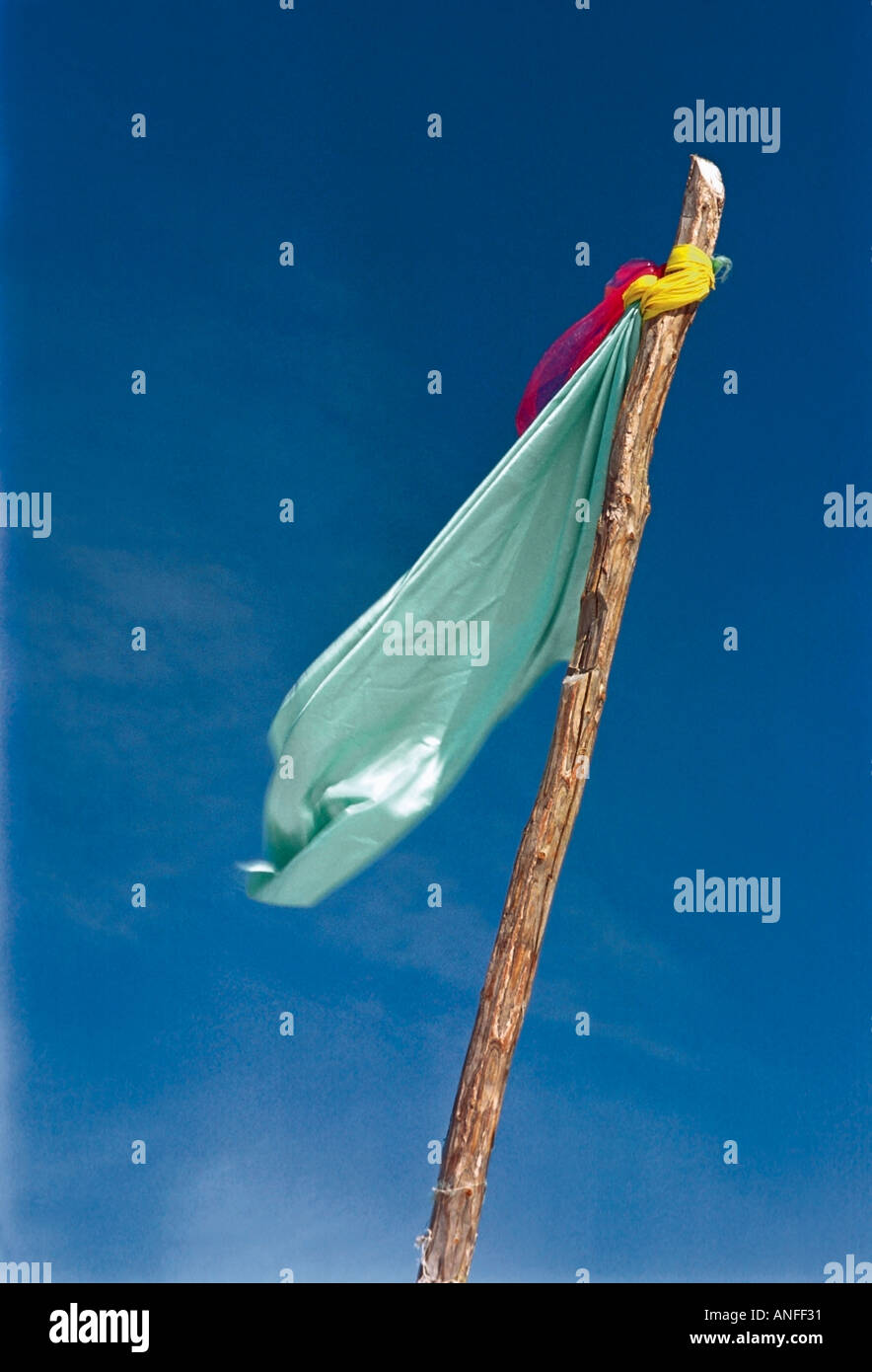 The flag of national Altaic colors over the mountainous Katu Yaryk Pass ...