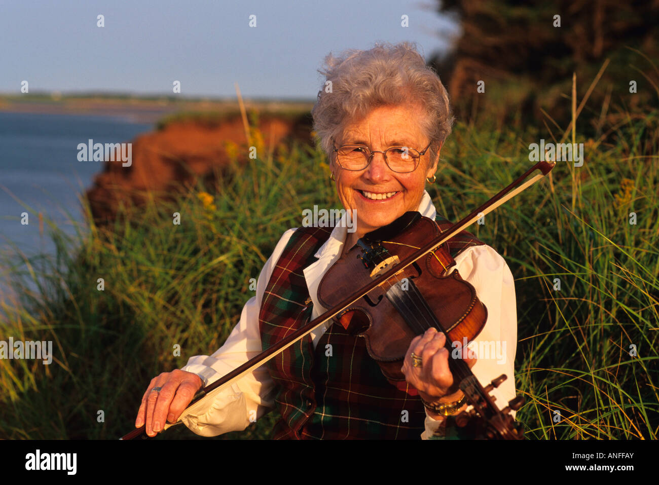 Woman playing the fiddle, Prince Edward Island, Canada Stock Photo - Alamy