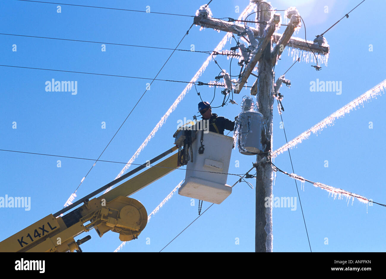 Lineman repairing damage after Ice storm, Tignish, Prince Edward Isalnd ...