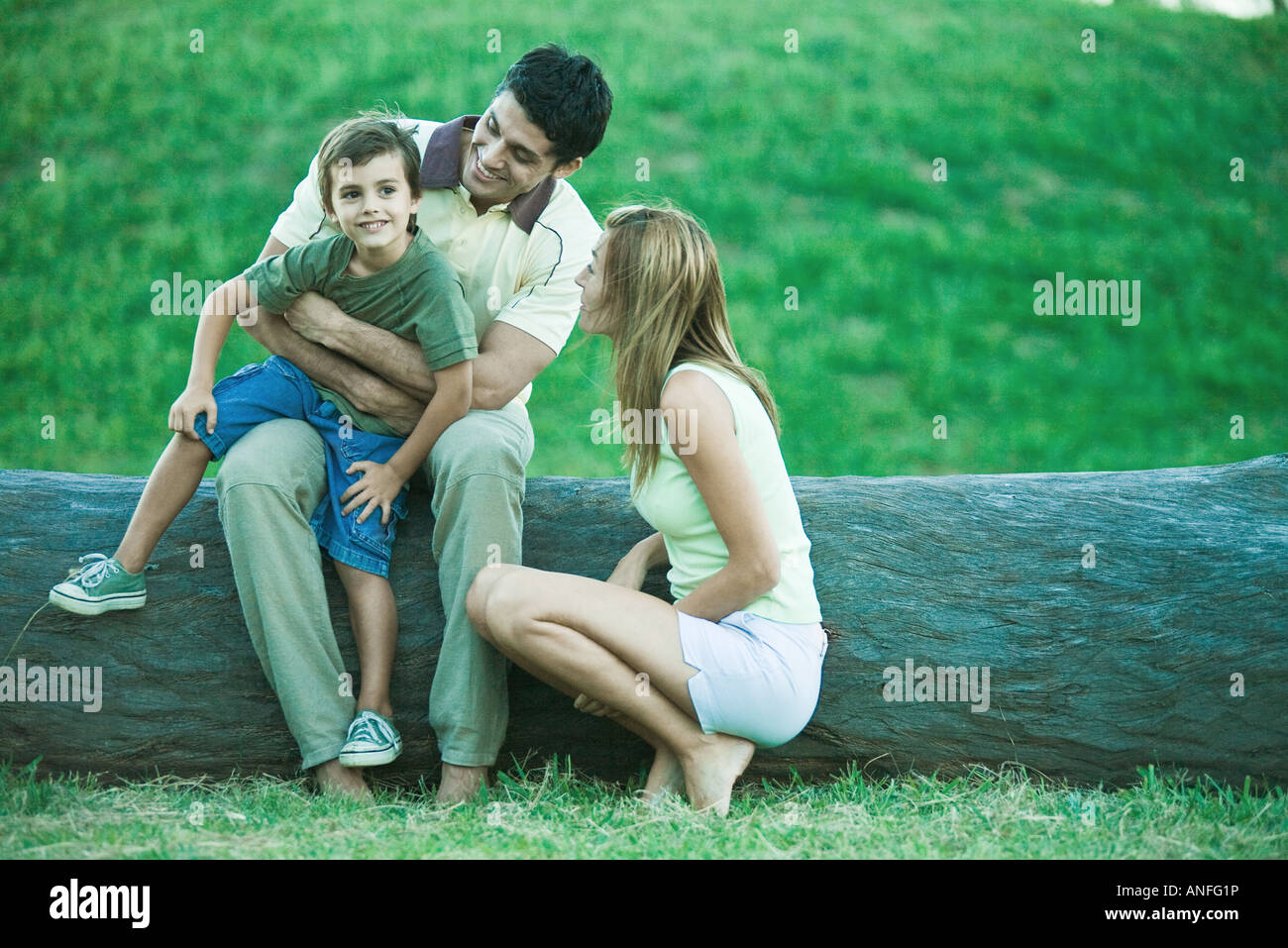 Boy Sitting On Fathers Lap Stock Photos & Boy Sitting On Fathers Lap ...