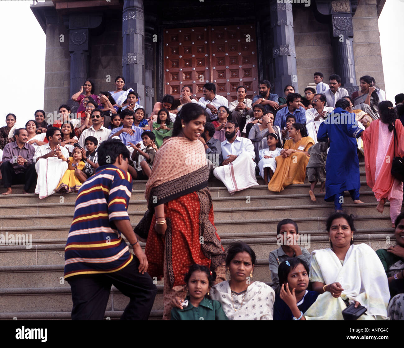 Indian families in Sunday best visit the Hindu Vivekananda Memorial on ...