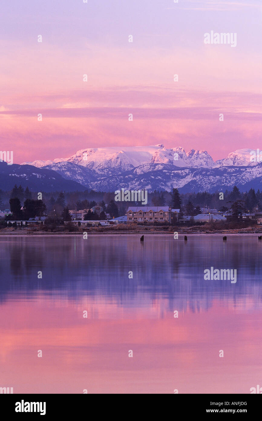 Early morning light on Comox Bay with Comox glacier in background ...
