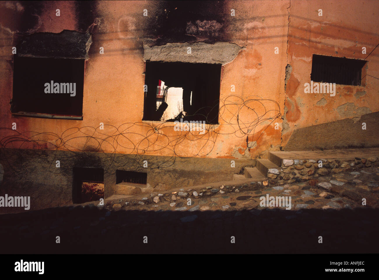 a burned house with wire, prizren, kosovo Stock Photo - Alamy