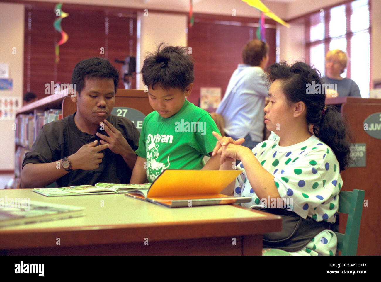 Asian american family mom dad father hi-res stock photography and ...