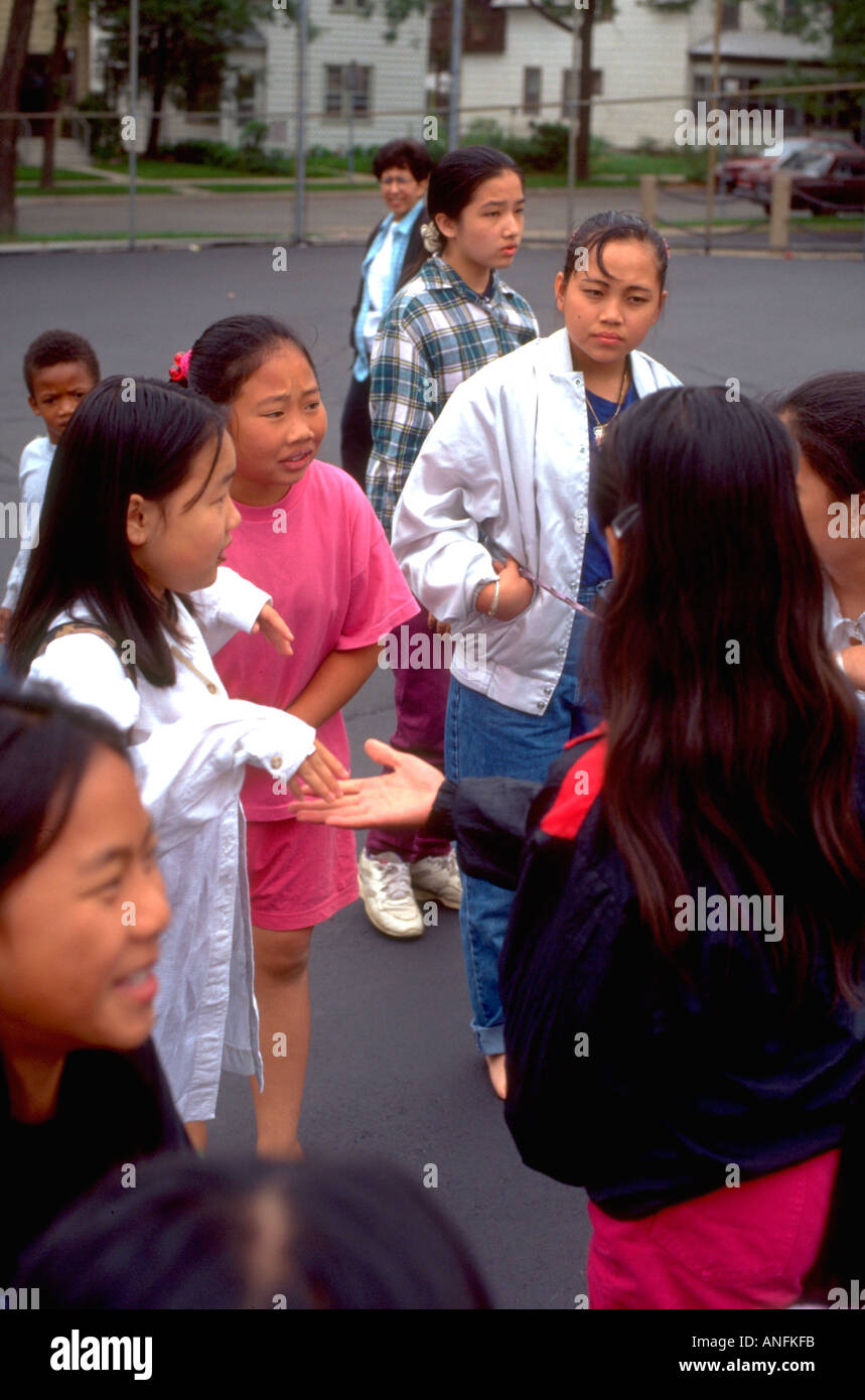 Children talking school playground hi-res stock photography and images ...