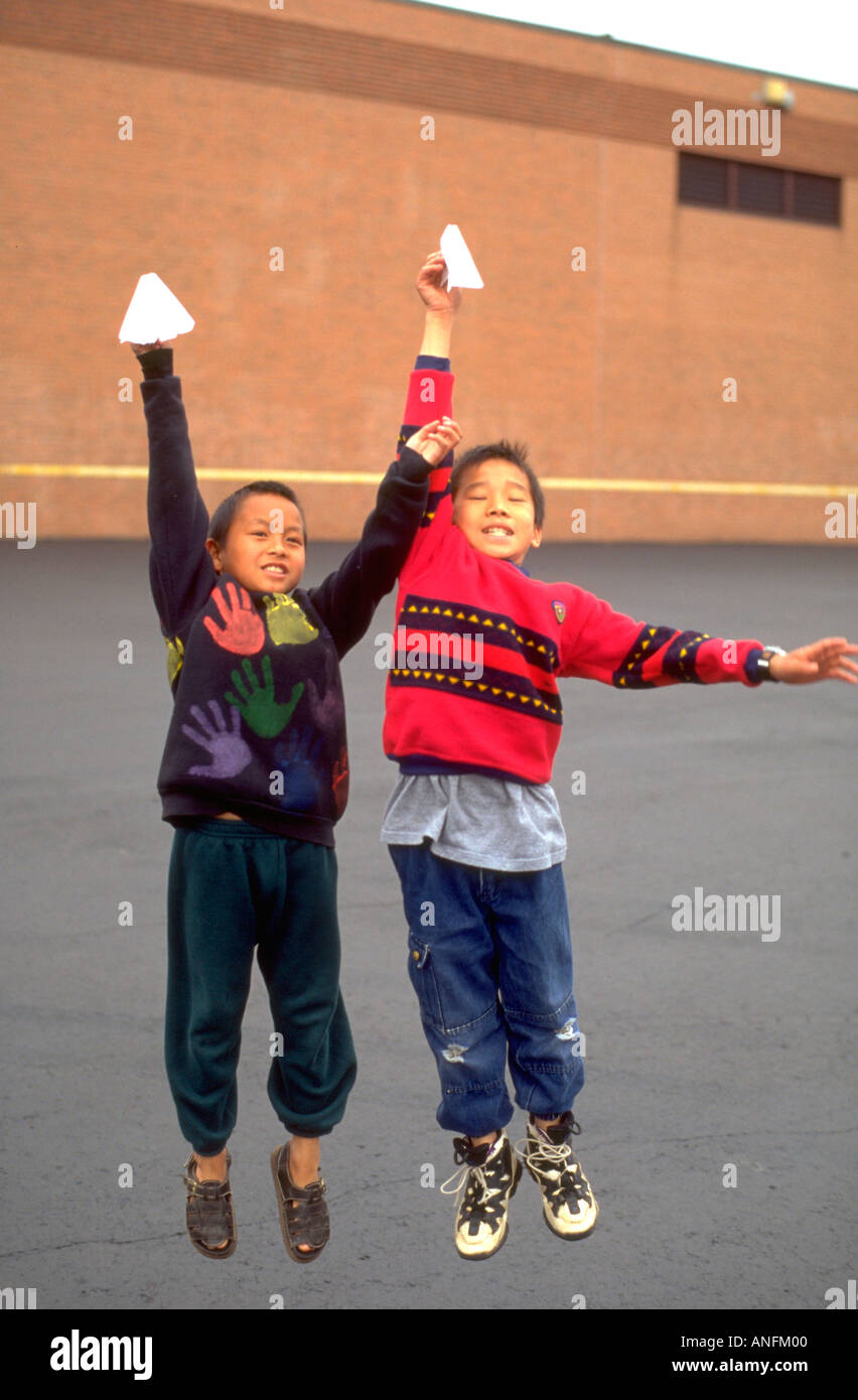 School children playing paper airplanes hi-res stock photography and ...