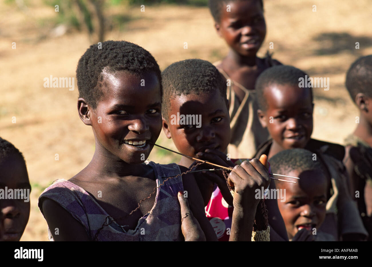 Landscape portrait of several poor rural children from a subsistence ...