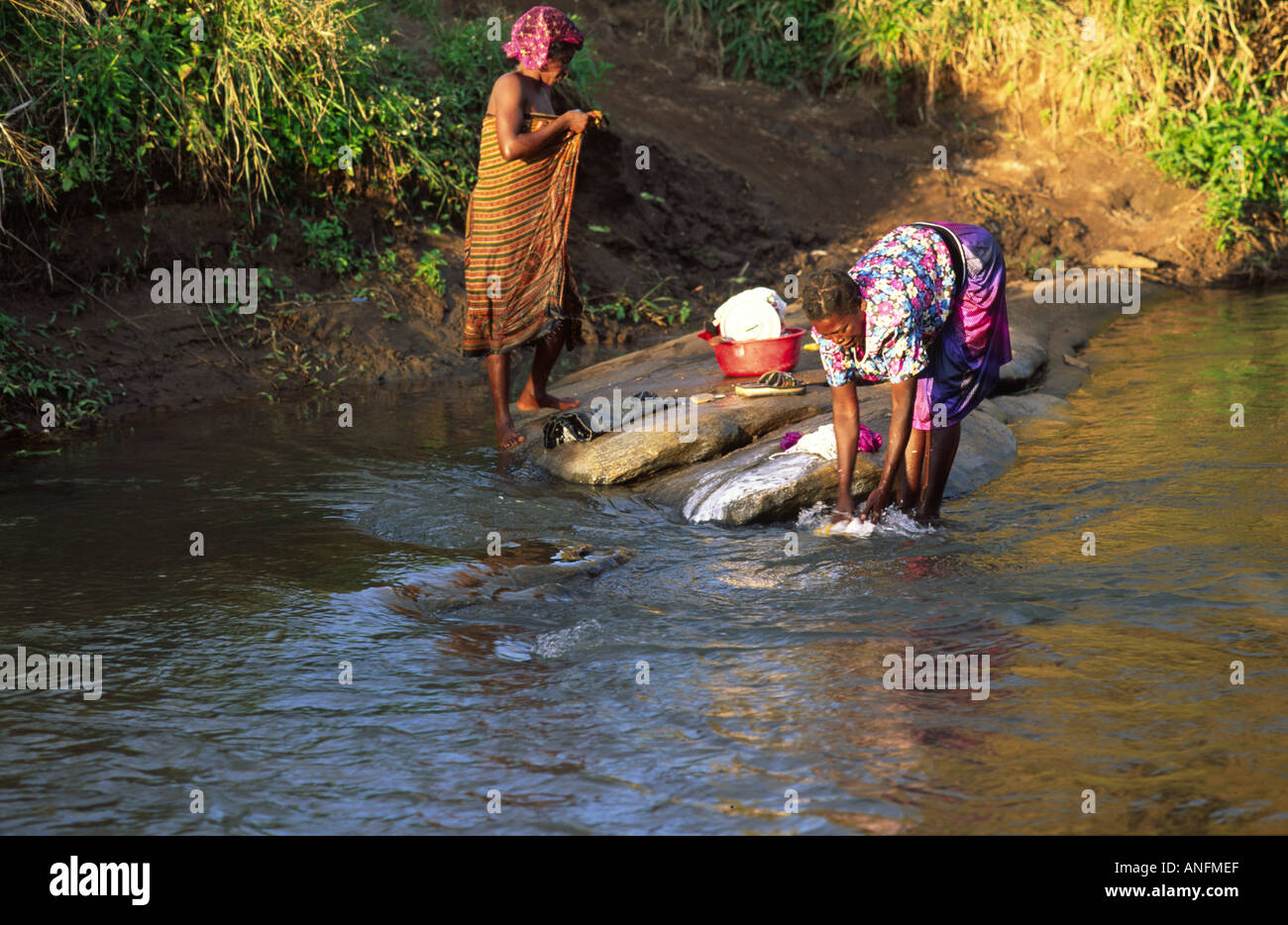 Cleaning scrubbing clothes hi-res stock photography and images - Alamy
