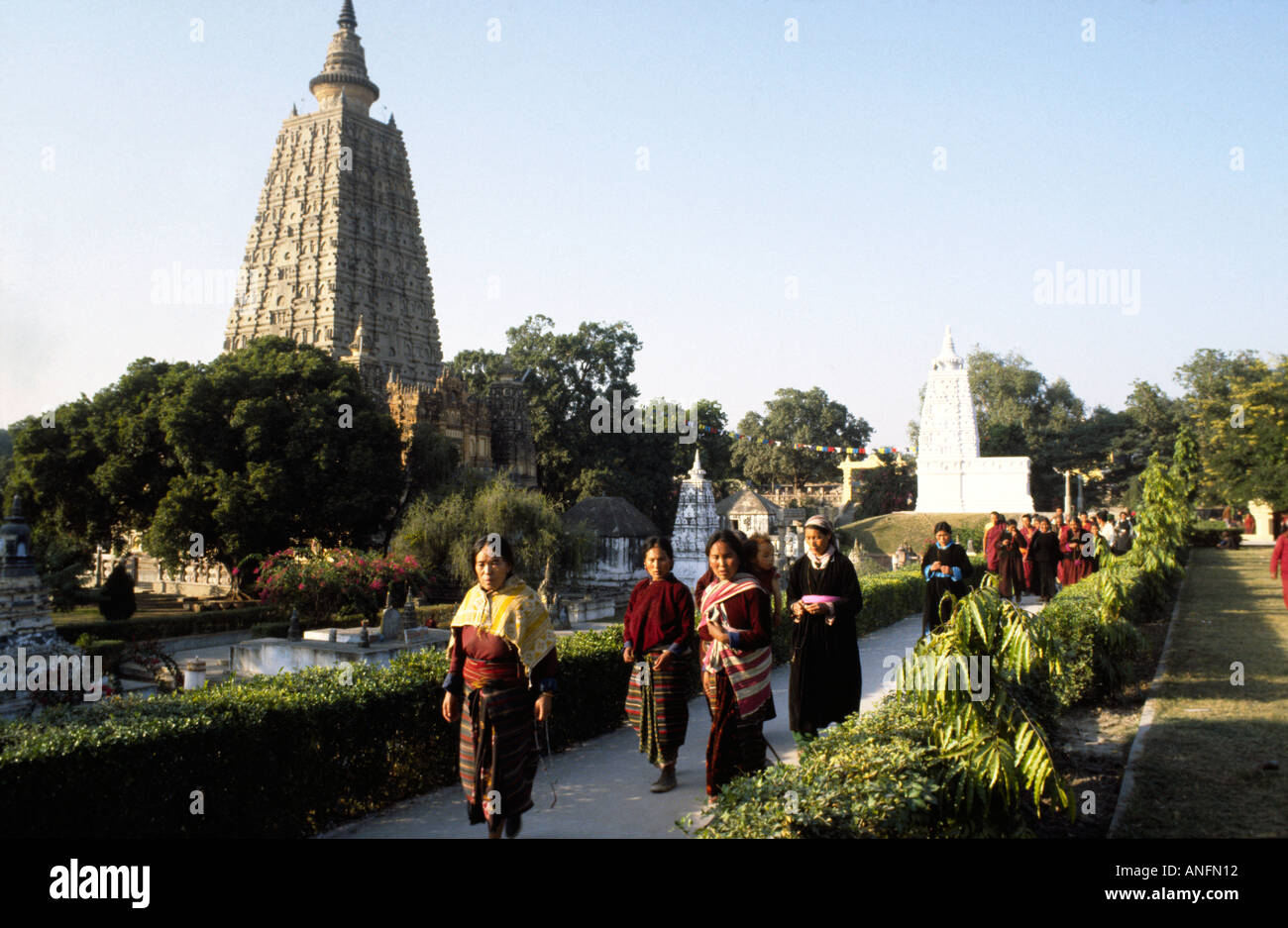 Tibetan Buddhist pilgrims circumambulating the Mahabodhi Temple, the ...