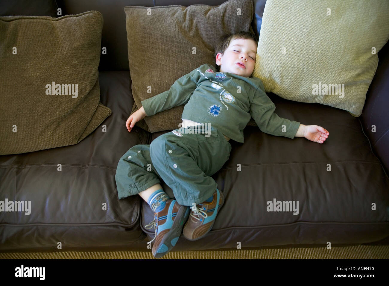 School boy sleeping on chair hi-res stock photography and images - Alamy
