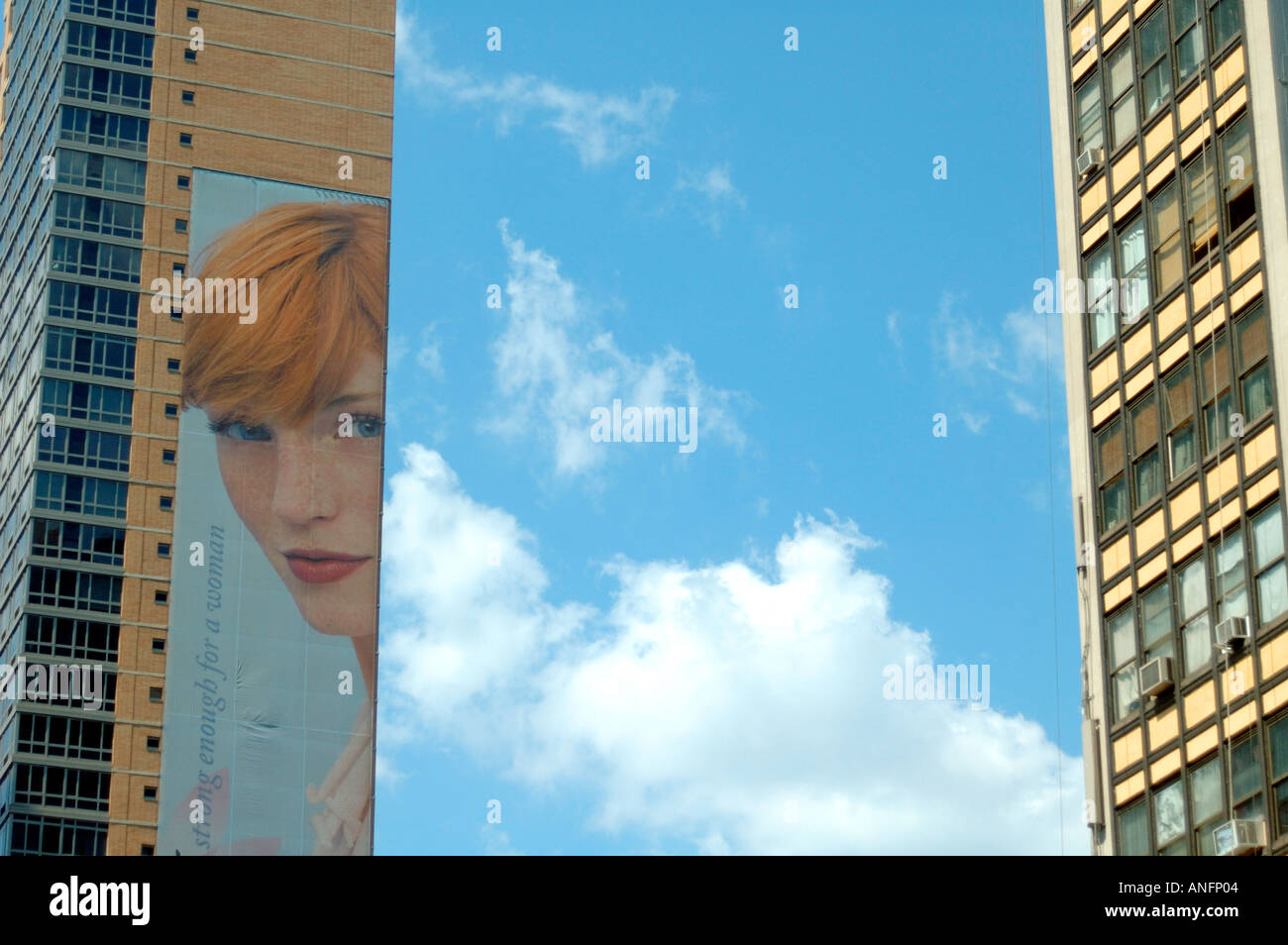 Huge Secret deodorant poster advertisement with blue sky, clouds, and ...