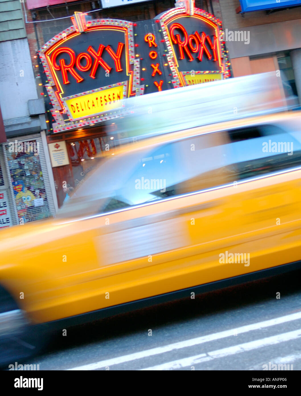Sign of the famous Roxy delicatessen restaurant with blurred passing ...