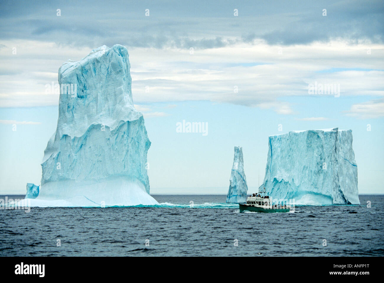 Icebergs and whale watching boat, Witless Bay Ecological Reserve ...