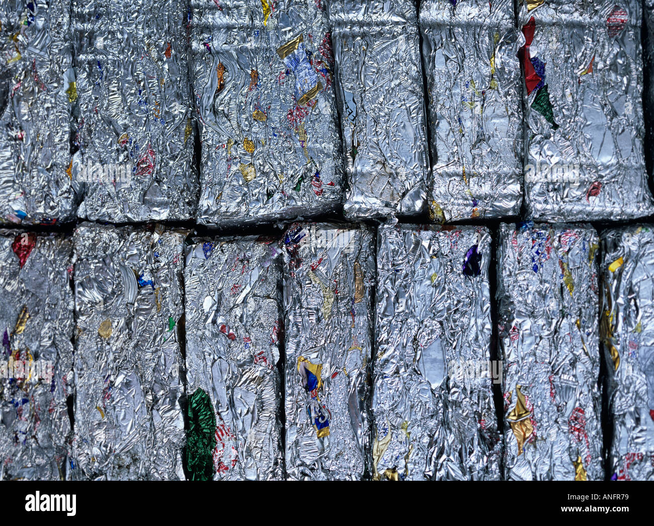 Aluminium foil collected from households baled ready for recycling ...