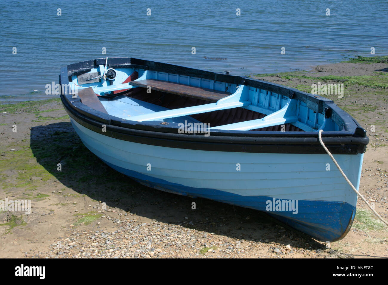 Blue rowing boat Stock Photo - Alamy