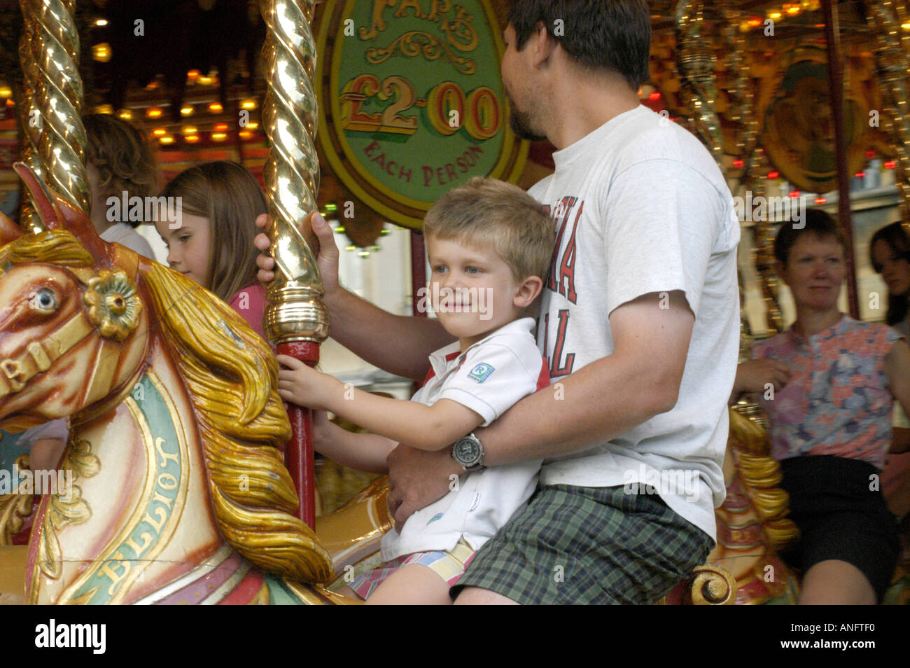 Family fun on the traditional merry go round roundabout at St Giles ...