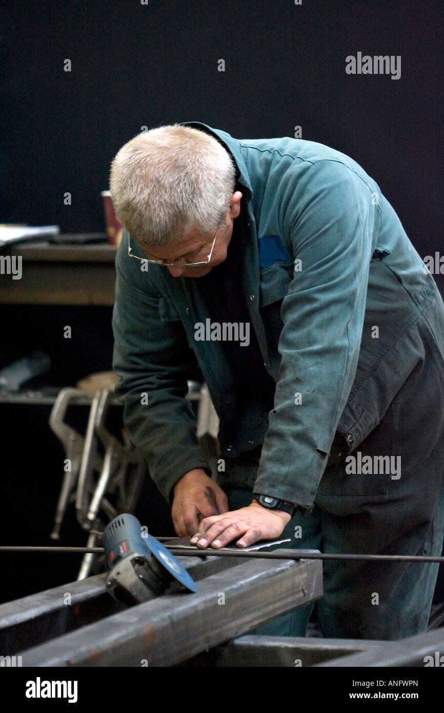 Metal worker in factory Stock Photo - Alamy