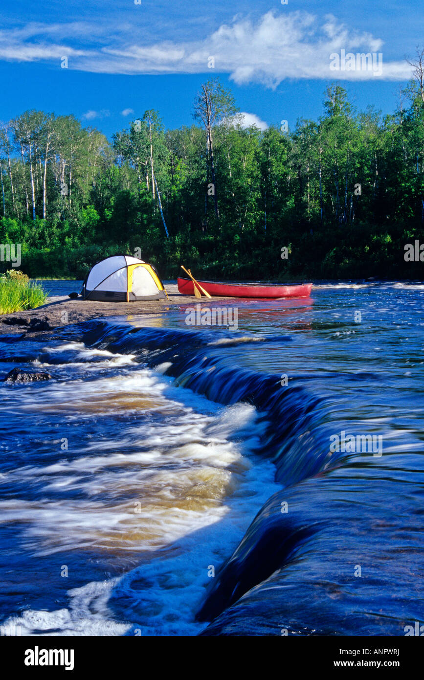 Tent and canoe along the Whiteshell River, Whiteshell Provincial Park ...