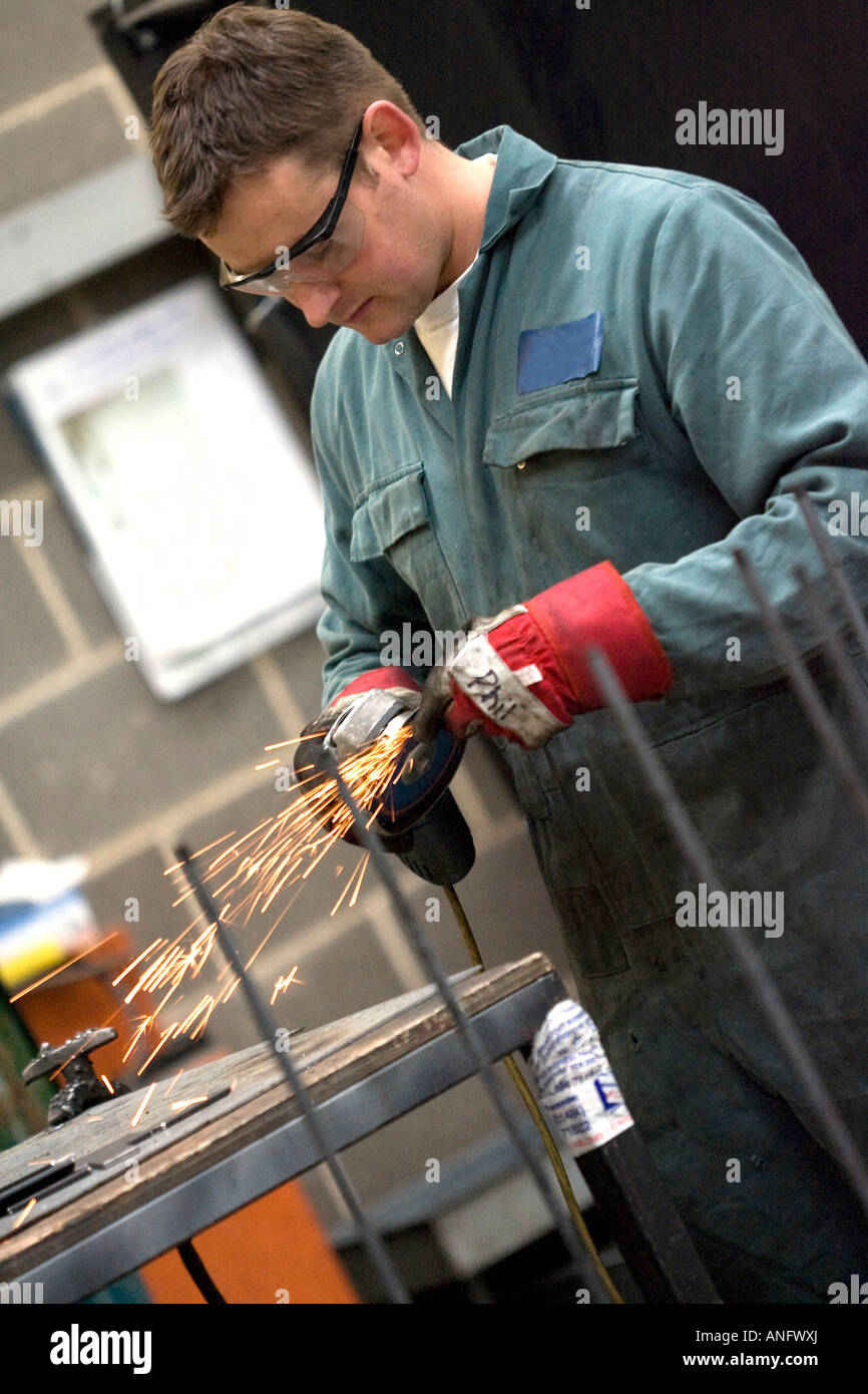Metal worker in factory Stock Photo - Alamy