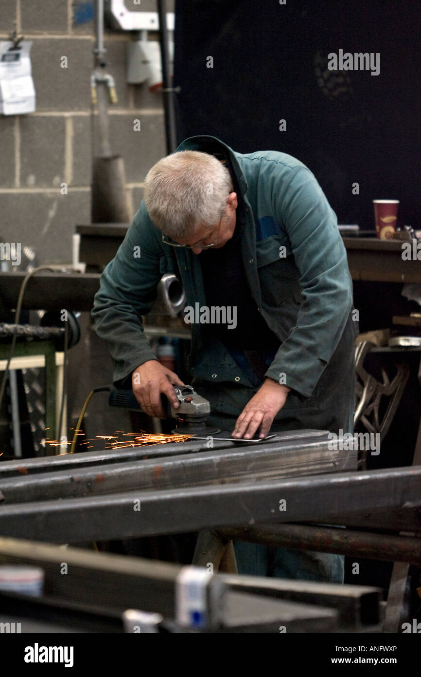 Metal worker in factory Stock Photo - Alamy