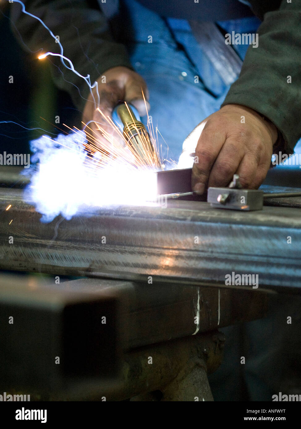 Metal worker in factory Stock Photo - Alamy