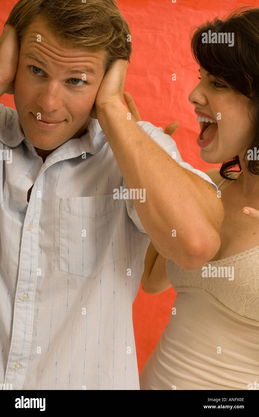 Couple heads together fighting hi-res stock photography and images - Alamy