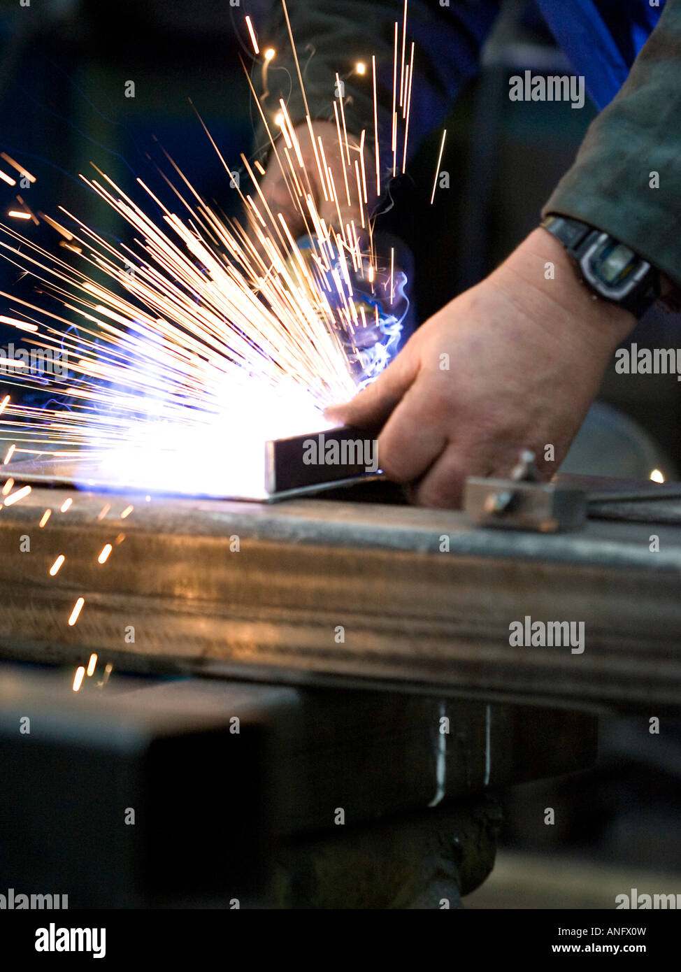 Metal worker in factory Stock Photo - Alamy