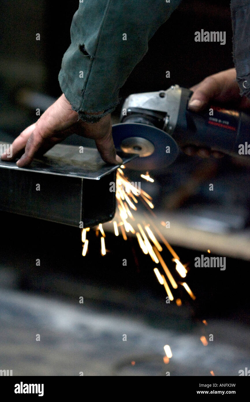 Metal worker in factory Stock Photo - Alamy