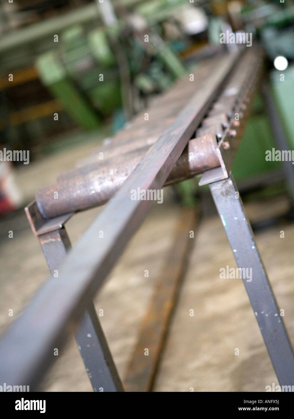 Factory worker rollers Stock Photo - Alamy