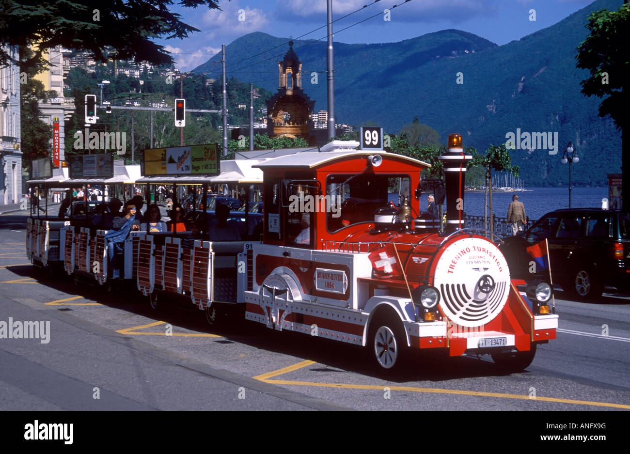 Tourist train in the lakeside resort of Lugano Stock Photo - Alamy